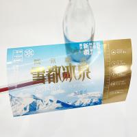 China 2024 Custom Transparent Water Bottle Labels Sticker Vinyl Waterproof Clear Gold Foil Logo Mineral Water Label Design for sale