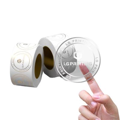 China Custom Printed Clear Black Transparent  Waterproof Label Seal Round Clear Cosmetic Box Packaging Label Sticker for sale