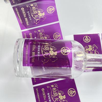 China Custom Printing Logo Clear Sticker Label  Waterproof Transparent Adhesive Label Sticker Roll for Water Juice Bottle for sale