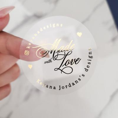 China Clear Print Transparent Label Gold Foil Logo Clear Round Water Adhesive Seal Label Sticker Roll  2024 for sale