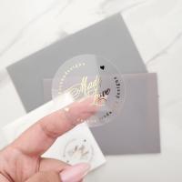 China Clear Print Transparent Label Gold Foil Logo Clear Round Water Adhesive Seal Label Sticker Roll  2024 for sale