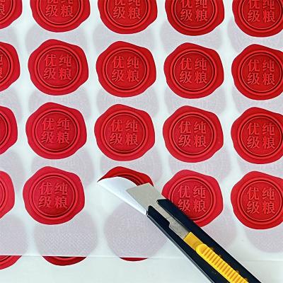 China Custom Design Die Cut Circle Red Embossed Sticker Labels Luxury Self-adhesive Jar Bottle Seal Labels Sheet With Embossed Logo for sale