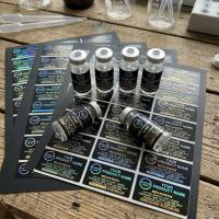 China Custom Printing Holographic Laser Black Vinyl Sticker for 3ml 5ml 10ml Vial Bottle Label for sale