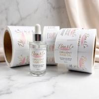 China Custom Face Serum Label Waterproof BOPP Gold Foil Cosmetic Bottle Sticker Roll Printing Private Logo Labels for sale