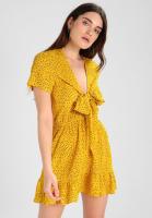 China Glamorous Day Dress Bow Tie Sexy Yellow Polka Dot Dress Women for sale
