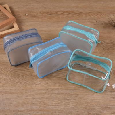 China Large Double Zipper Cosmetic Bag Pouches Clear Holographic Laser PVC TPU Lady Traveling for sale