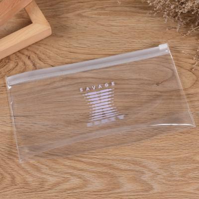 China 11 Inch 12 Inch Clear Cosmetic Bag 20cm Soft Custom Logo TPU PVC EVA for sale