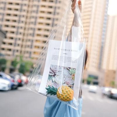 China Transparent  Clear PVC Tote Bag Clear Purse For School Stadium Concerts Plastic Purse for sale