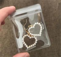 China Gift Clear PVC Packaging Bag For Business With Zipper Self Sealing Zip Lock Ring Earrings for sale