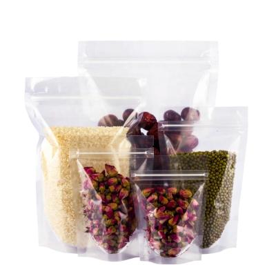 China Cheap Price Clear Zipper Heat Sealable Zip Lock Plastic Stand up Pouch Bag for Snack Food Tea Packing for sale