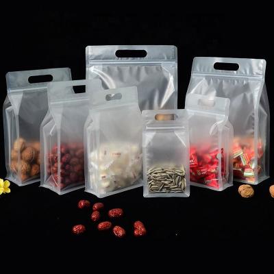 China Eight Side Sealing Plastic Packaging Frosted Bag Flat Bottom Stand up Pouch Transparent Zipper Bag with Handle Hole for sale