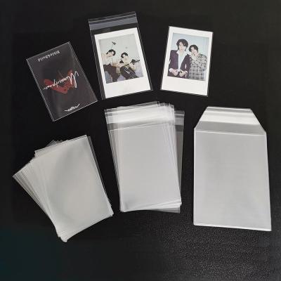 China Custom Card Sleeve Transparent Trading Card Sleeve Soft Clear Game Sport Kpop Photo Card Sleeve for sale