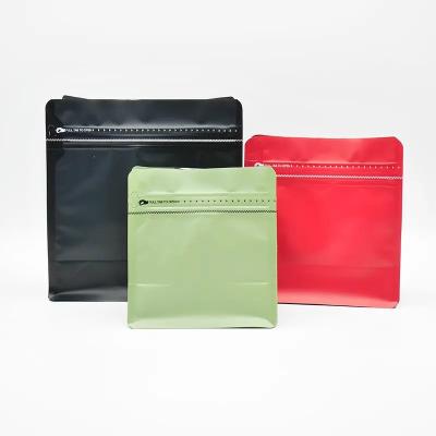 China Matte Black/White PE Waterproof Plastic Mylar 1KG Flat Bottom Stock Bag with Valve RTS for Coffee Bean Packaging for sale