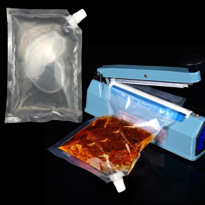 China Heat Seal Clear Spout Pouch Open Bottom Flat Plastic Spout Pouch Sauce Salad Syrups Bag with Screw Cap for sale