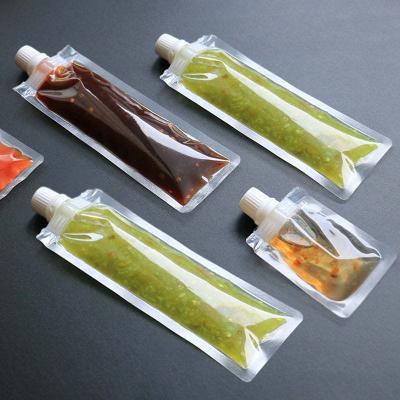 China Clear Mini Spout Pouch 10ml 15ml 20ml 30ml Dipping Sauce Salad Bag Small Plastic Spout Pouch with Hole for sale