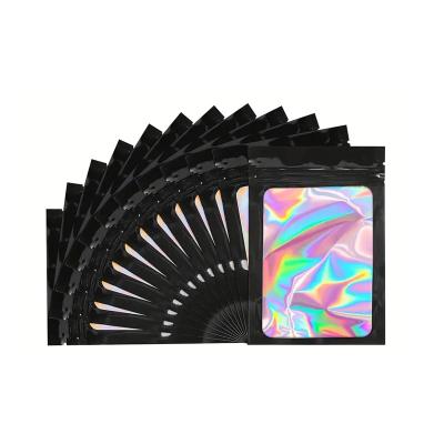 China Custom Printed Holographic Cosmetic Hologram Zipper 3 Sides Self Sealing Packaging Bags Christmas Zipper Small Mylar Bags for sale