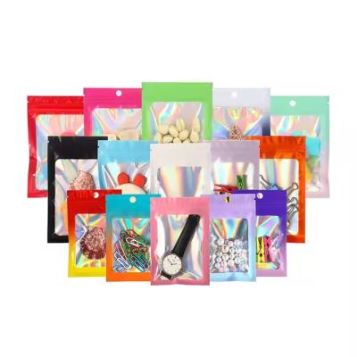 China Wholesale Price Reusable Holographic Zip Gravure Printed Transparent Plastic Bags Aluminum Foil Bag for sale