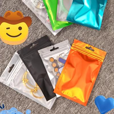 China Multifunctional Thickened Colorful Transparent Window Matte Resealable Candy  Plastic Packaging Aluminum Foil Bags for sale
