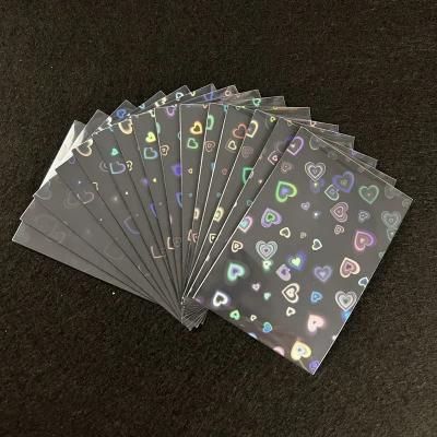 China Custom Printed Holographic Card Sleeves Personalized Plastic Bags for sale