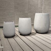China 10-Inch Round Fiber Clay Planter with Hand-Carved Design - 6-8mm Thickness for Outdoor Garden Use for sale