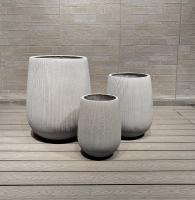 China 10-Inch Round Fiber Clay Planter with Hand-Carved Design - 6-8mm Thickness for Outdoor Garden Use for sale
