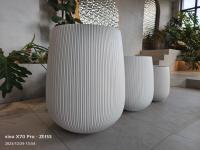 China 10-Inch Round Fiber Clay Planter with Hand-Carved Design - 6-8mm Thickness for Outdoor Garden Use for sale