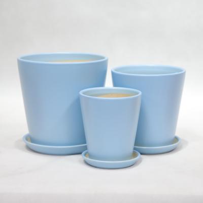 China QUANGUI QG-CM014 Round Ceramic Planter with Glossy Finish and Drainage Holes for Indoor Plants for sale