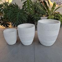 China Fiber Clay Planter Round Hand Carved Texture Frost Resistant 10-30 Inch Indoor Outdoor for sale