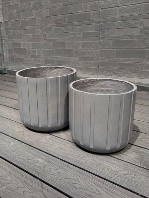 China Fiber Clay Planter Round 350mm 320mm Hand Carved Frost Resistant with Drainage Holes for sale