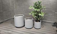 China Frost Resistant Fiber Clay Planter Hand Carved Round 3 Sizes Indoor Outdoor for sale
