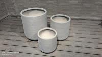 China Frost Resistant Fiber Clay Planter Hand Carved Round 3 Sizes Indoor Outdoor for sale