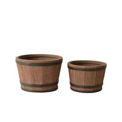 China Quangui Fiber Clay Planter Hand Carved Frost Resistant Indoor Outdoor Garden Pot 300mm 230mm for sale
