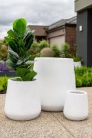 China Enhance Your Garden With Elegant Fiber Clay Planters Round Shape for sale