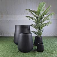China Enhance Your Garden With Elegant Fiber Clay Planters Round Shape for sale