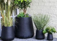 China Enhance Your Garden With Elegant Fiber Clay Planters Round Shape for sale