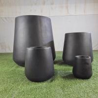China Enhance Your Garden With Elegant Fiber Clay Planters Round Shape for sale