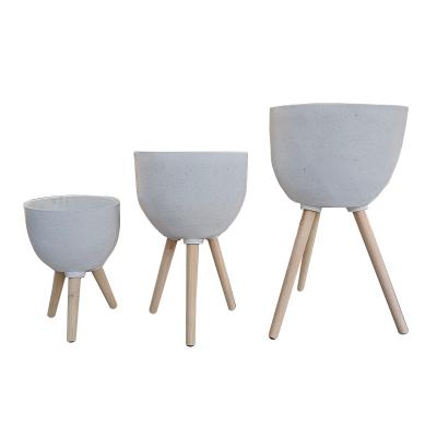 China Fiber Clay Planter Round 7-8 Years Indoor Life Hand Carved Finish Custom Color for sale
