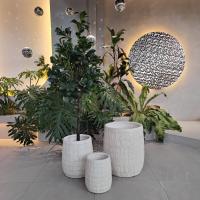 China Modern Reinforced Clay Planter Textured Surface For Minimalist Style for sale