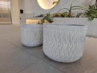 China Fiber Clay Planter Hand Carved Round Durable Outdoor Indoor 370mm for sale
