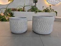 China Fiber Clay Planter Hand Carved Round Durable Outdoor Indoor 370mm for sale