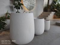 China Smooth Surface Fiberclay Planter For Customed Plant Display Options for sale