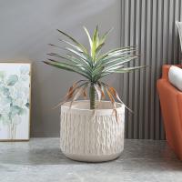 China Frost Resistant Patio Fiber Clay Planters Round Shape for sale