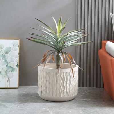 China Frost Resistant Patio Fiber Clay Planters Round Shape for sale