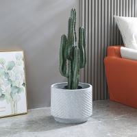 China Frost Resistant Patio Fiber Clay Planters Round Shape for sale