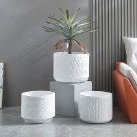 China Frost Resistant Patio Fiber Clay Planters Round Shape for sale