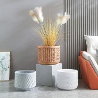 China Frost Resistant Patio Fiber Clay Planters Round Shape for sale