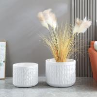 China Frost Resistant Patio Fiber Clay Planters Round Shape for sale