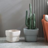 China Chic Fiber Clay Planter Elevate Your Plant Display with Minimalist Design for sale
