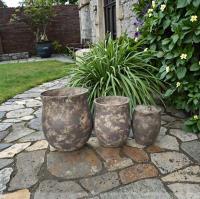 China Fiber Clay Planter Round Hand Carved Vintage 300mm 410mm for Indoor Outdoor Decoration for sale