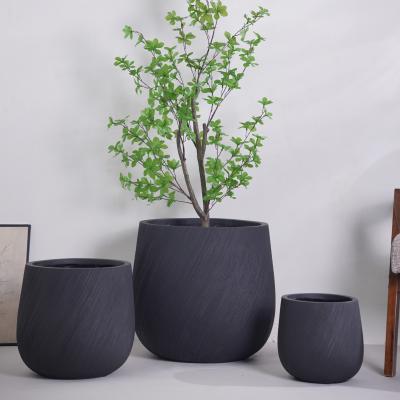 China Quangui Fiber Clay Planter Round Modern Indoor Outdoor Durable 5-6 Year Outdoor Life Custom Color for sale